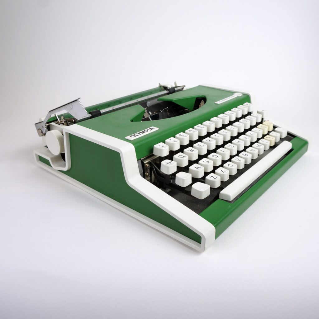 Green Olympia Traveller deLuxe Typewriter - My Cup Of Retro Typewriters